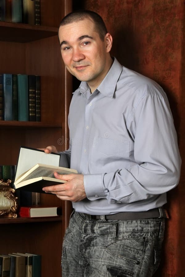 Man with a book stock photo. Image of book, smiling, studio - 28068786