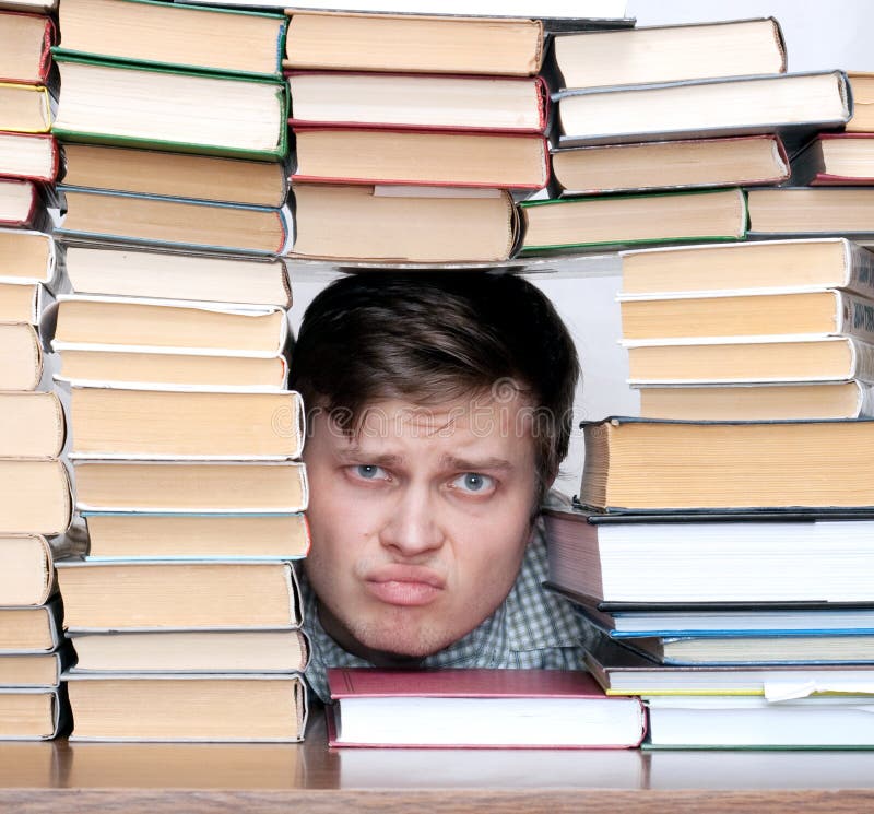 Man between books stock image. Image of homework, desk - 13108389