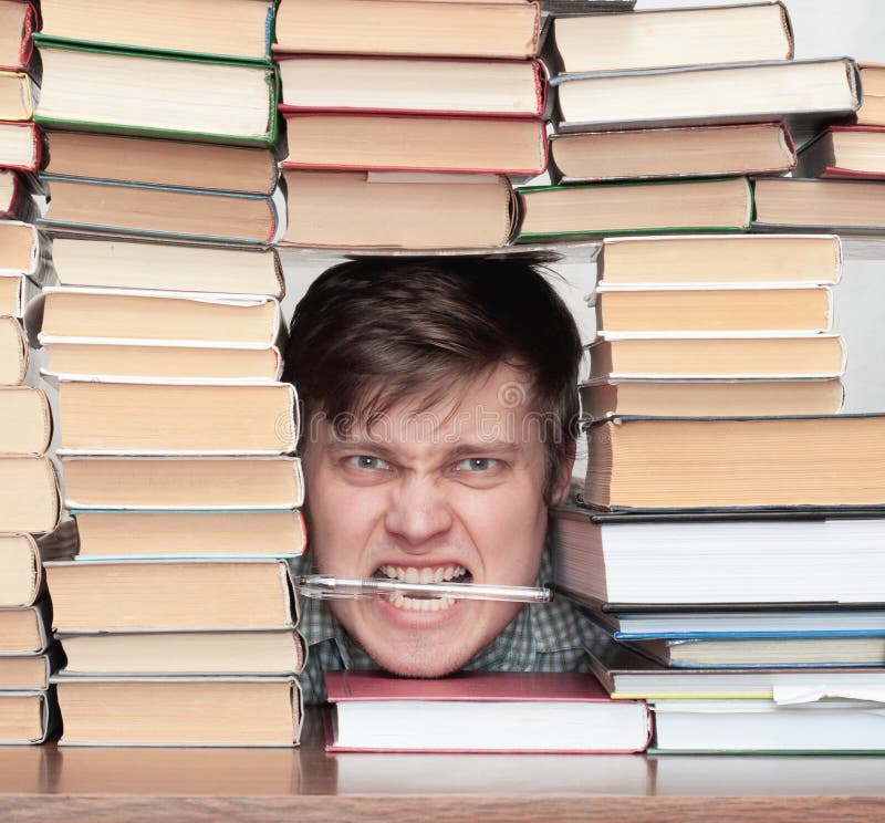 Man between books stock photo. Image of knowledge, student - 13108396