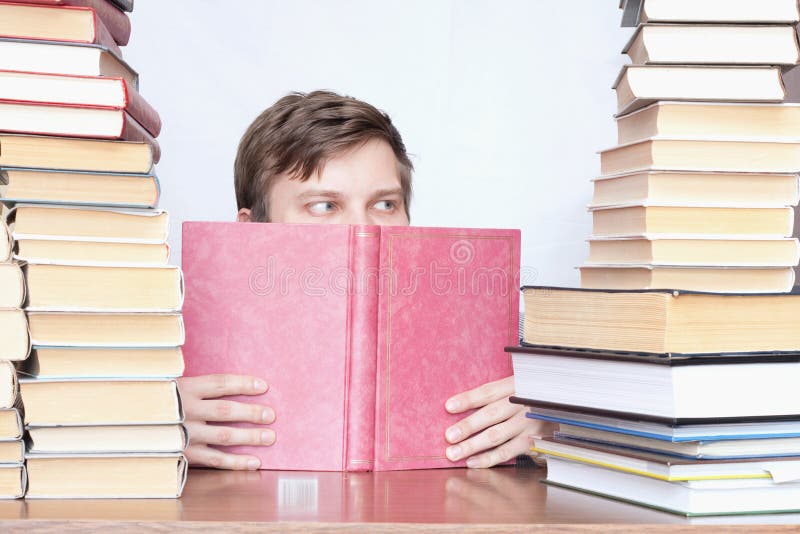 Man between books stock image. Image of school, schoolboy - 13108477