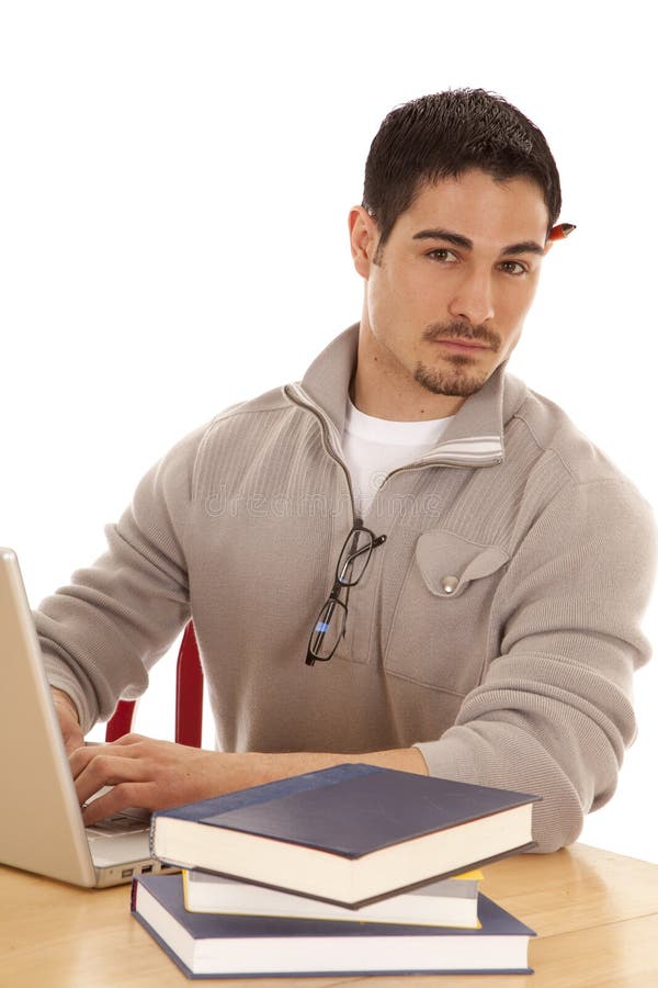 Man with books and laptop stock image. Image of casual - 19490621