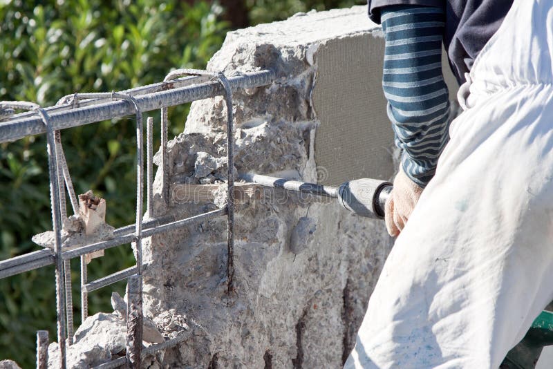 Man with boring machine stock photo. Image of builder - 27746450