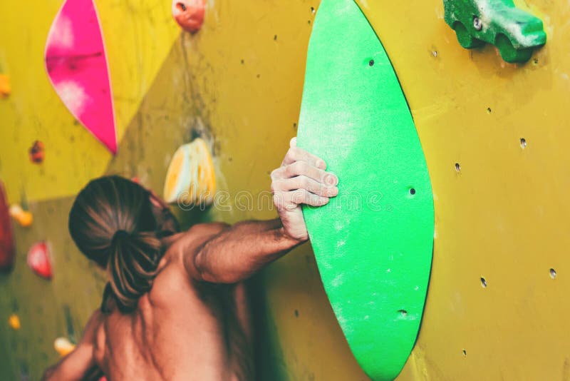 Man in boulder gym stock image. Image of bouldering - 160132389