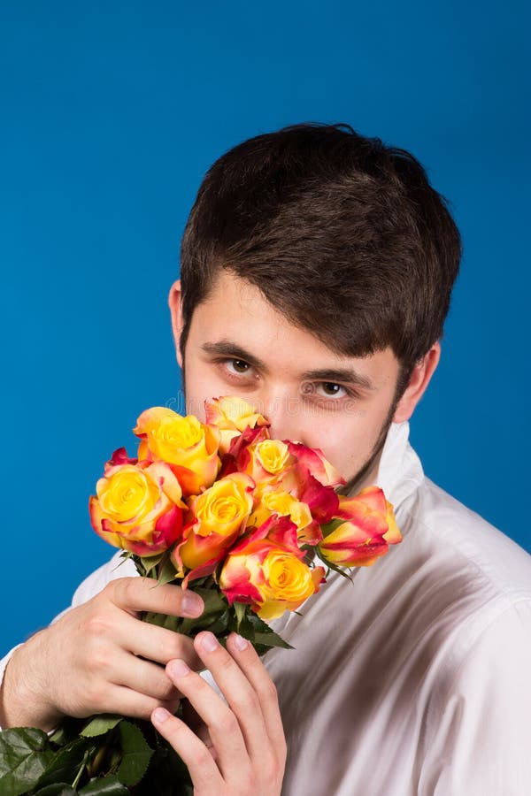 Man with Bouquet of Red Roses Stock Photo - Image of elegance, front ...