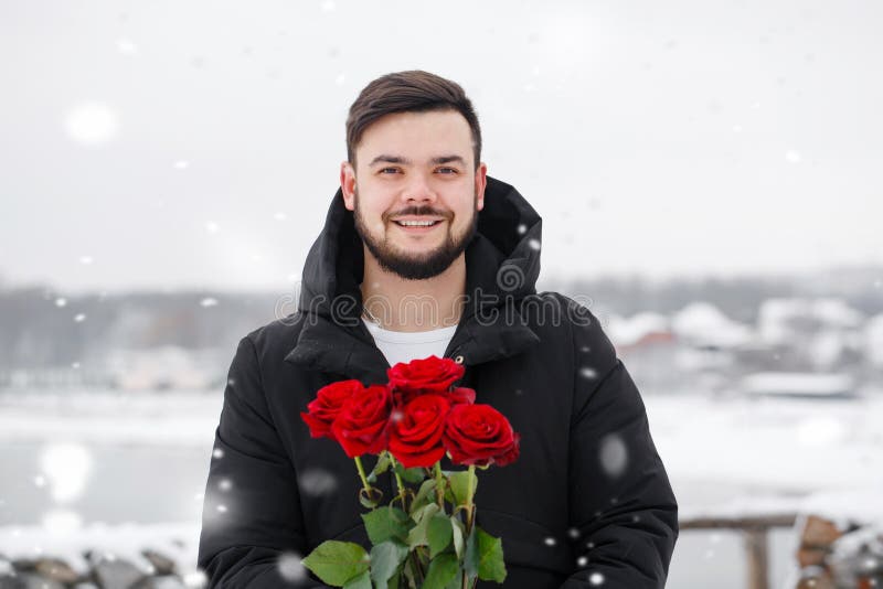 Romantic Young Man with Bouquet of Red Roses in Hands Stock Image ...