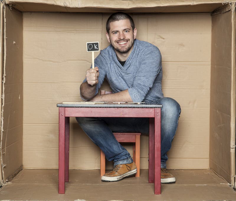Man in a Box with a Badge OK Stock Image - Image of expression, look ...