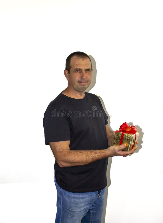 A Man with a Box with a Gift for the Holiday Stock Image - Image of ...