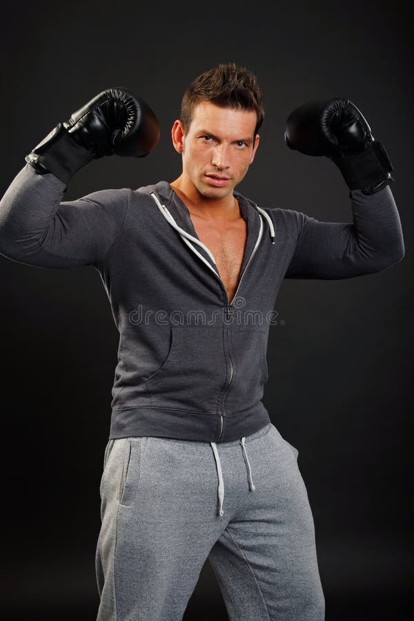 Man with boxer gloves stock image. Image of hold, muscle - 39792333