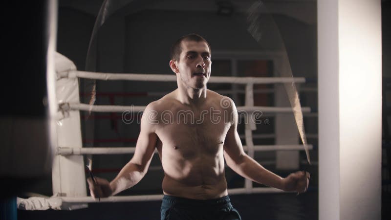 A Man Boxer Jumping Over the Rope Stock Photo - Image of power ...
