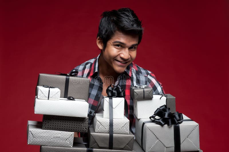 Man with boxes of presents stock photo. Image of clothing - 24016782