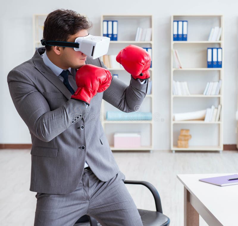 Man Boxing in the Office with Virtual Reality Goggles Stock Image ...