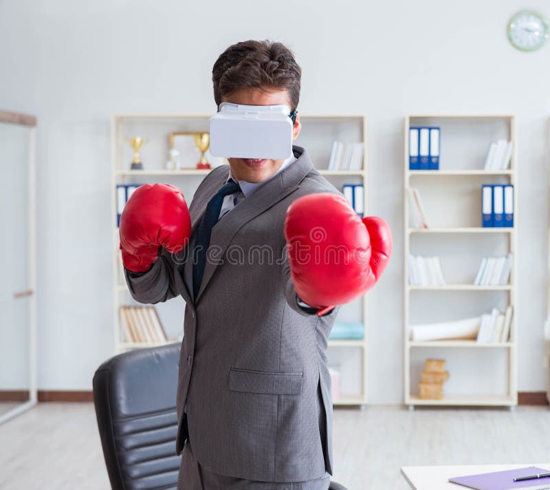 Man Boxing in the Office with Virtual Reality Goggles Stock Image ...
