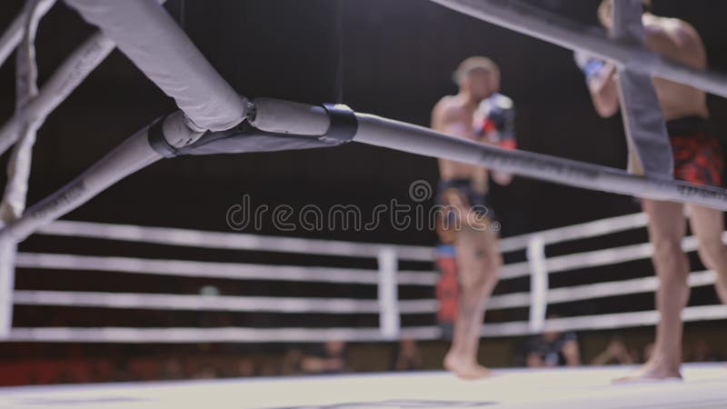 A Man is Boxing in a Ring with a Referee Watching Stock Video - Video ...