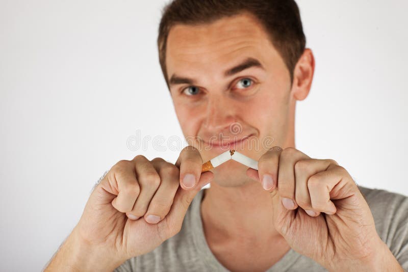 Man Breaking a Cigarette. Quit Smoking! Stock Image - Image of cancer ...