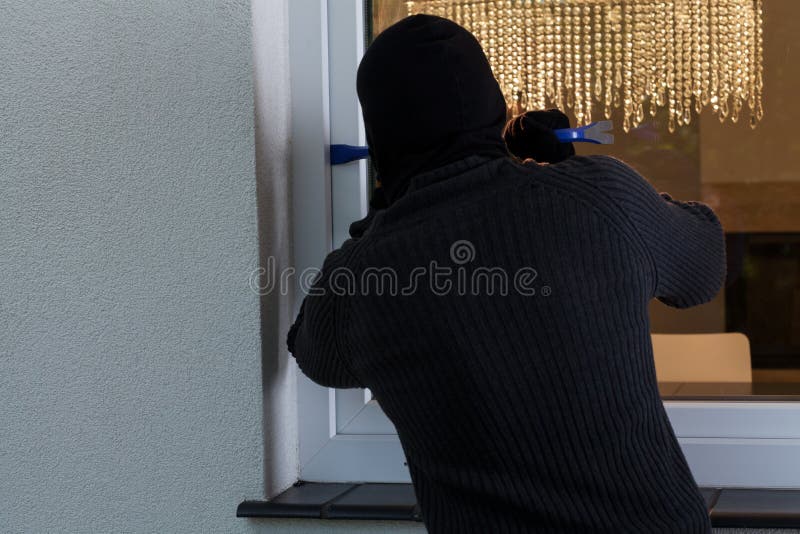 Man Breaking into the House Stock Image - Image of danger, risk: 46850889