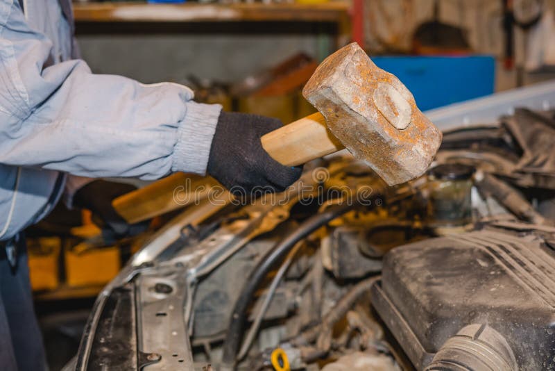 The man breaks the car. stock photo. Image of worker - 89783588