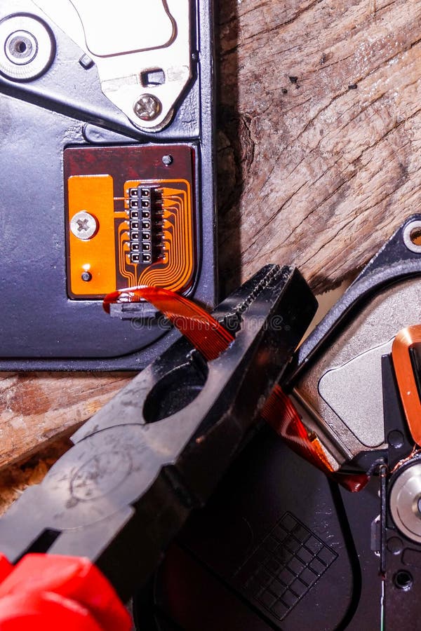 A Man Breaks a Computer Using Locksmith Tools Stock Photo - Image of ...