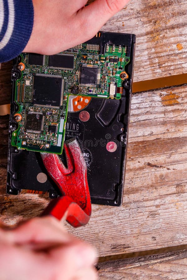 A Man Breaks a Computer Using Locksmith Tools Stock Photo - Image of ...