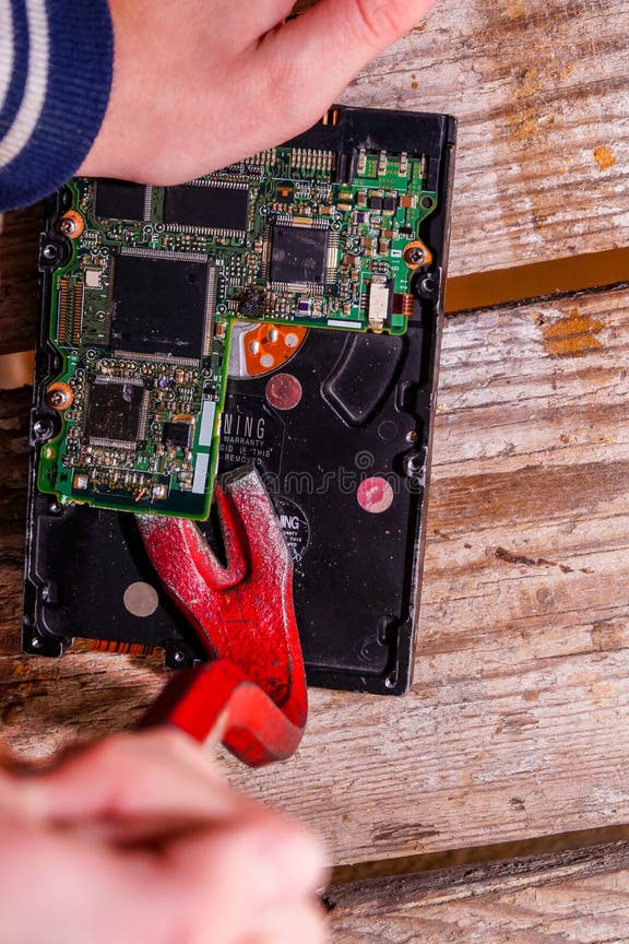A Man Breaks a Computer Using Locksmith Tools Stock Photo - Image of ...