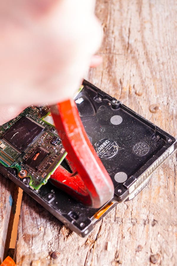A Man Breaks a Computer Using Locksmith Tools Stock Photo - Image of ...