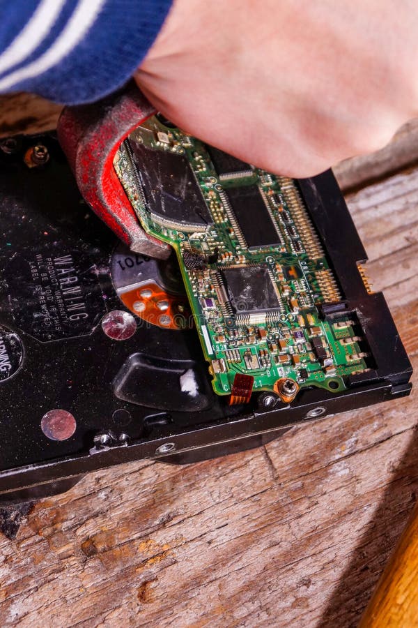 A Man Breaks a Computer Using Locksmith Tools Stock Photo - Image of ...