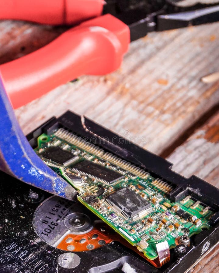 A Man Breaks a Computer Using Locksmith Tools Stock Photo - Image of ...