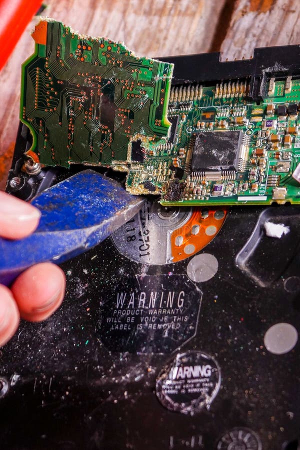 A Man Breaks a Computer Using Locksmith Tools Stock Photo - Image of ...
