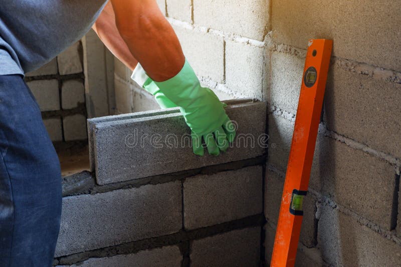 Man Bricklayer is Catch Cement Brick Block for To Get Straight in the ...