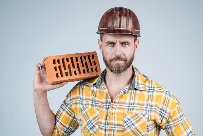 Handsome bricklayer stock photo. Image of muscular, male - 34773952