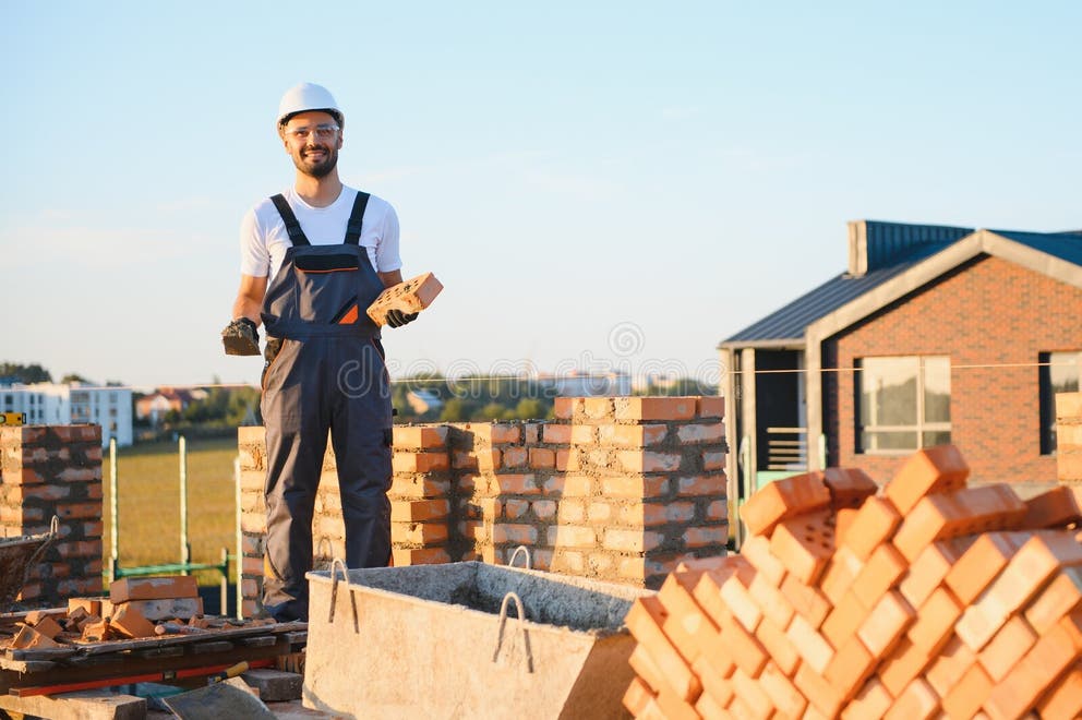 Man Bricklayer Installing Bricks on Construction Site Stock Image ...