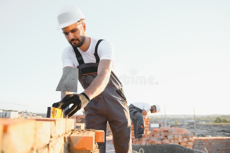 1,038 Man Bricklayer Installing Bricks Construction Site Stock Photos ...