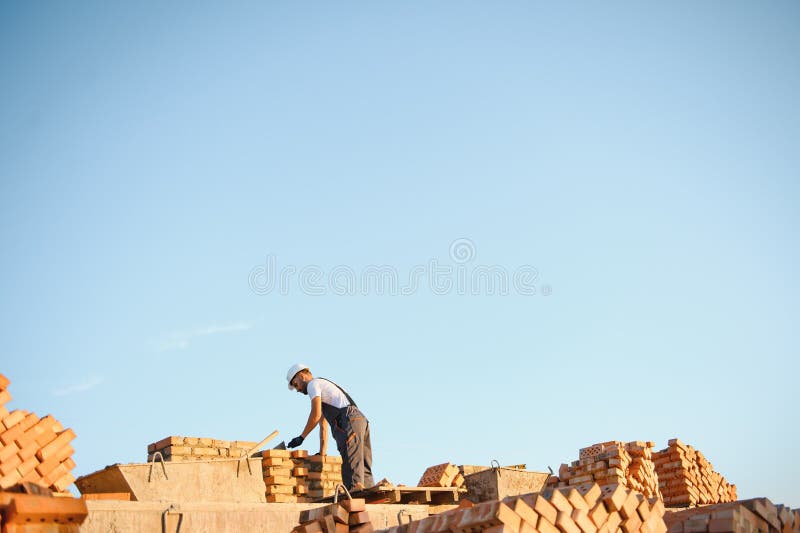 1,038 Man Bricklayer Installing Bricks Construction Site Stock Photos ...