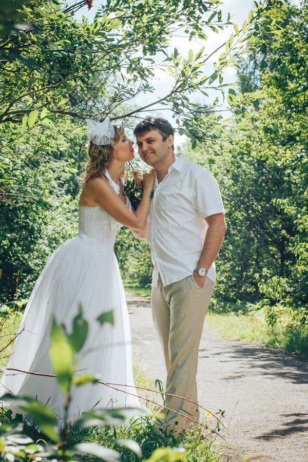 Man and Bride in the Green Park in a Summer Stock Photo - Image of ...