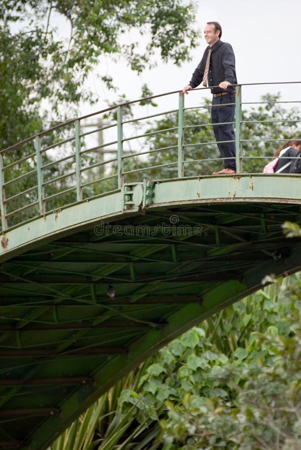 Man on Bridge stock image. Image of bridge, river, outdoors - 5033341
