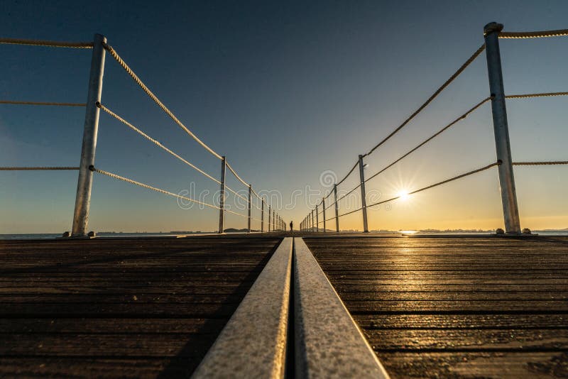 Man bridge and sun stock photo. Image of arquitecture - 199471870