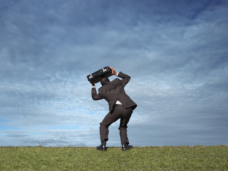 Man with Briefcase Over Head Stock Photo - Image of shield, lawn: 11749542