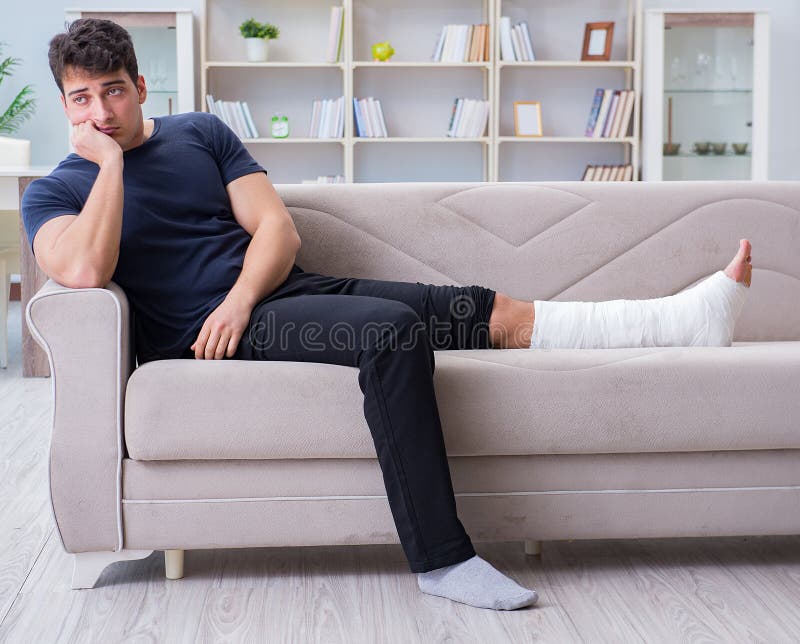 Man with Broken Leg Recovering at Home Stock Photo - Image of injury ...
