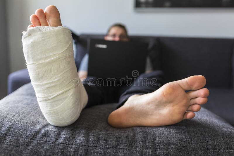 Man with a Broken Leg is Surfing the Internet Stock Image - Image of ...