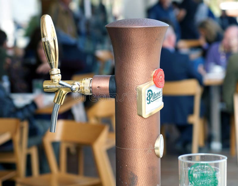 Man Brooch Draft Beer during Demonstration. is an Alcoholic Beverage ...
