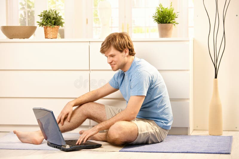 Man browsing internet stock photo. Image of bright, browsing - 16418756