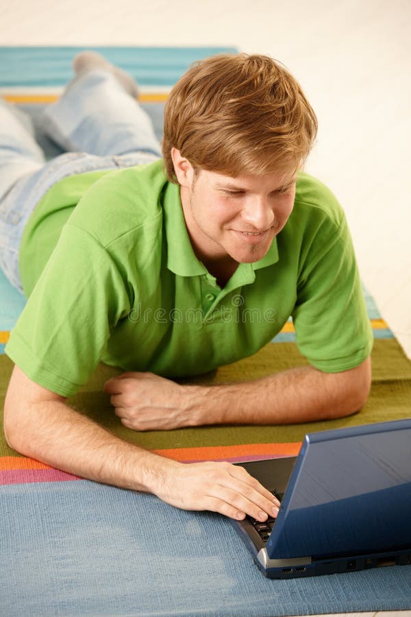 Man browsing internet stock photo. Image of leisure, goodlooking - 19674236