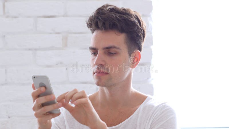 Man Browsing Online on Smart Phone Stock Image - Image of communication ... Man Browsing Online on Smart Phone Stock Image - Image of communication ...