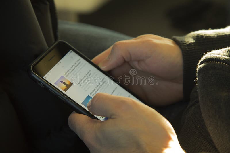 Man Browsing the Web on a Mobile Phone Editorial Photo - Image of ...