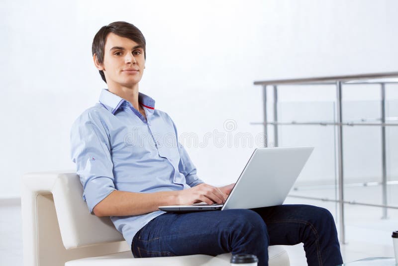 Man browsing web stock image. Image of white, table, young - 57101021