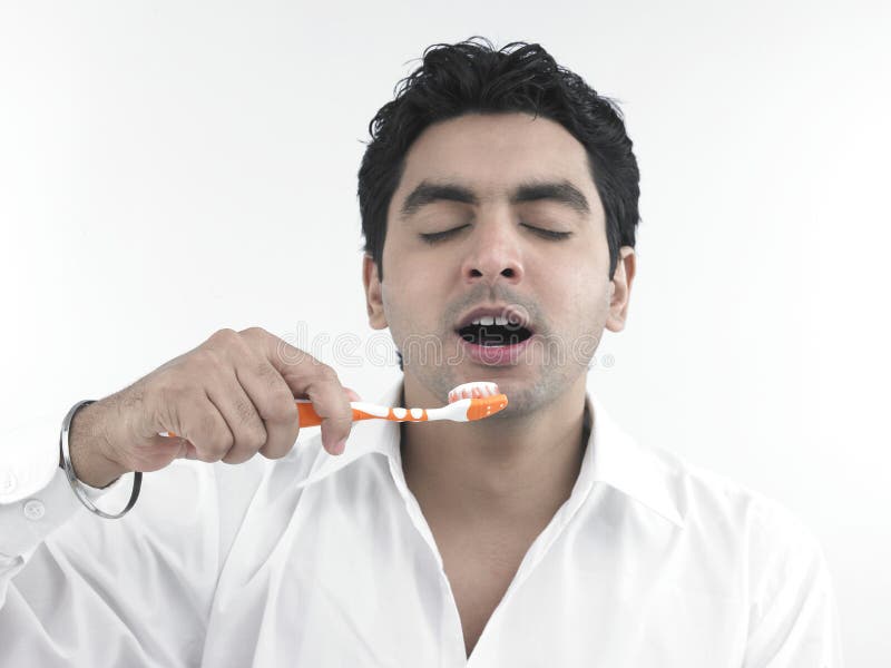 Man brushing his teeth stock photo. Image of closeup, dental - 7320546