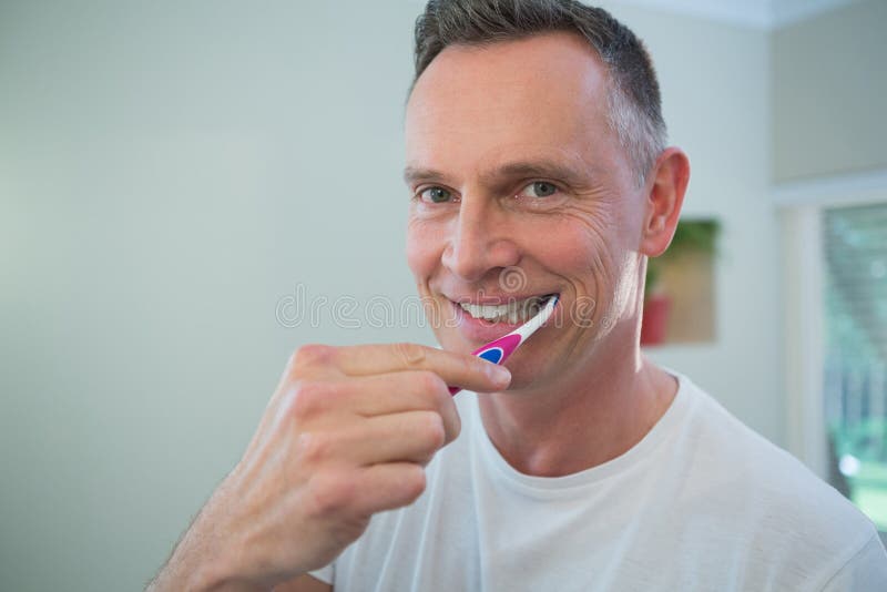 Man Brushing His Teeth with Toothbrush Stock Image - Image of domicile ...