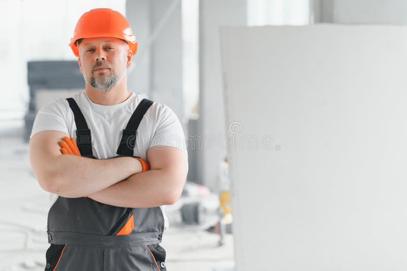 Man Builder. Architect is Standing in Building. Portrait of Thinking ...