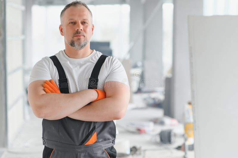 Man Builder. Architect is Standing in Building. Portrait of Thinking ...