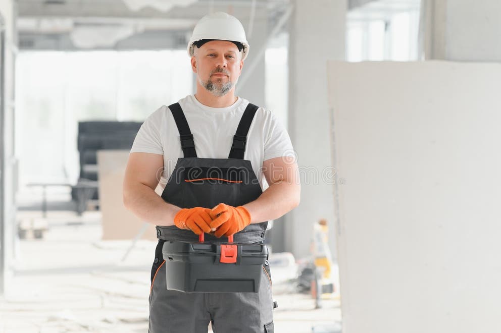 Man Builder. Architect is Standing in Building. Portrait of Thinking ...