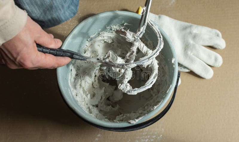 Man Builder Mixes Gypsum Putty Stock Image - Image of overhauls ...